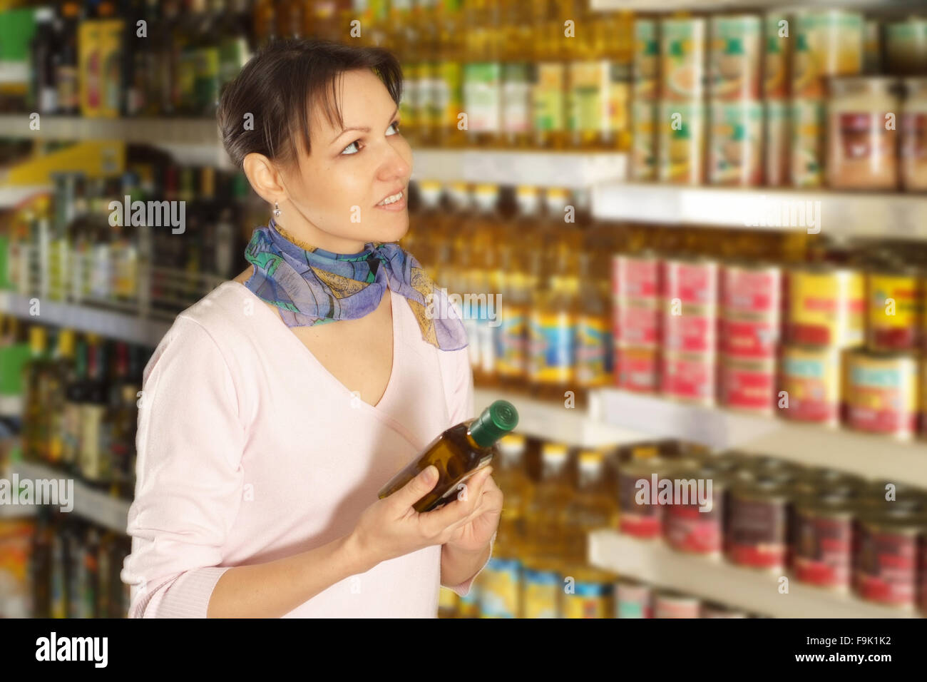 Interesting woman in the store Stock Photo - Alamy