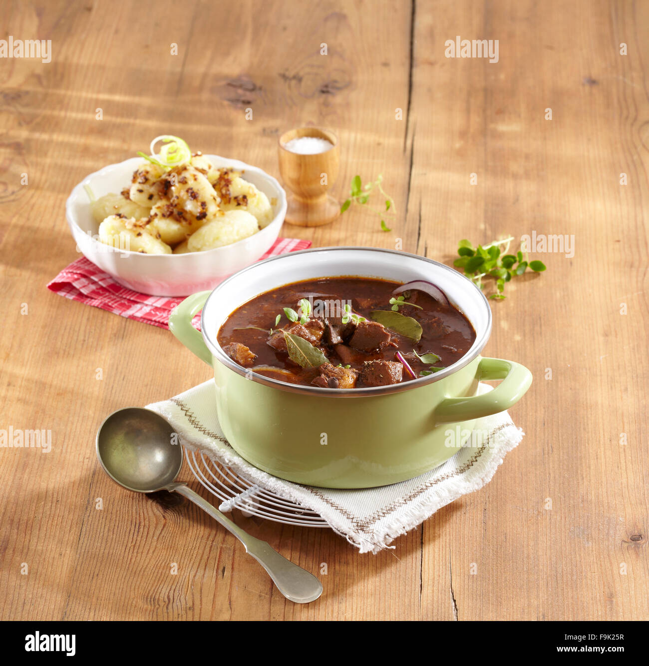 Pork goulash with entrails + steps Stock Photo - Alamy