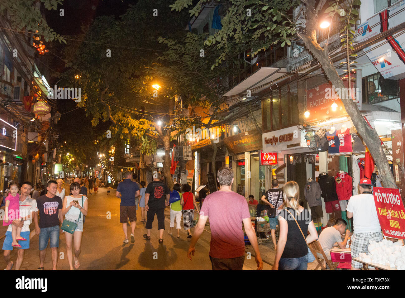 night time street scene in Hanoi old quarter, city centre, capital city ...