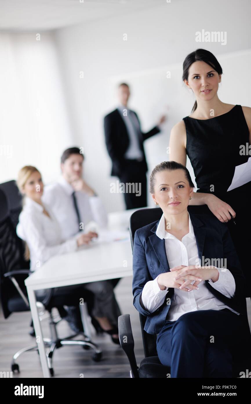 business woman with her staff, people group in background at modern ...