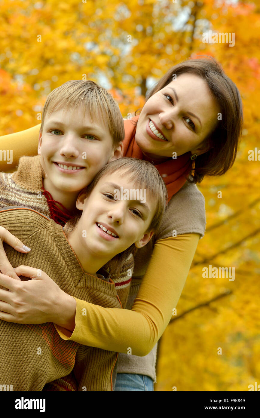 Mother and sons Stock Photo - Alamy