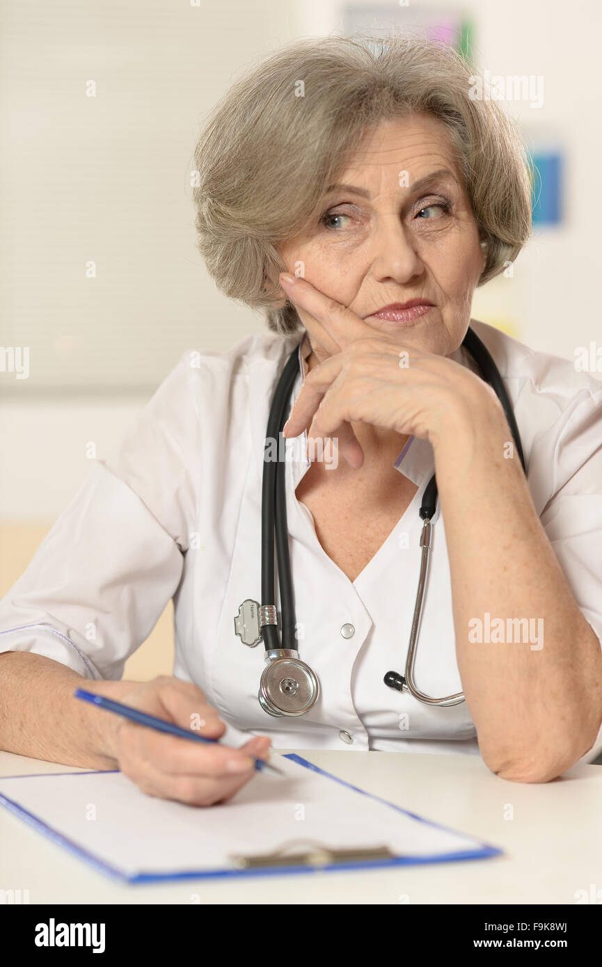 Elderly woman doctor Stock Photo - Alamy
