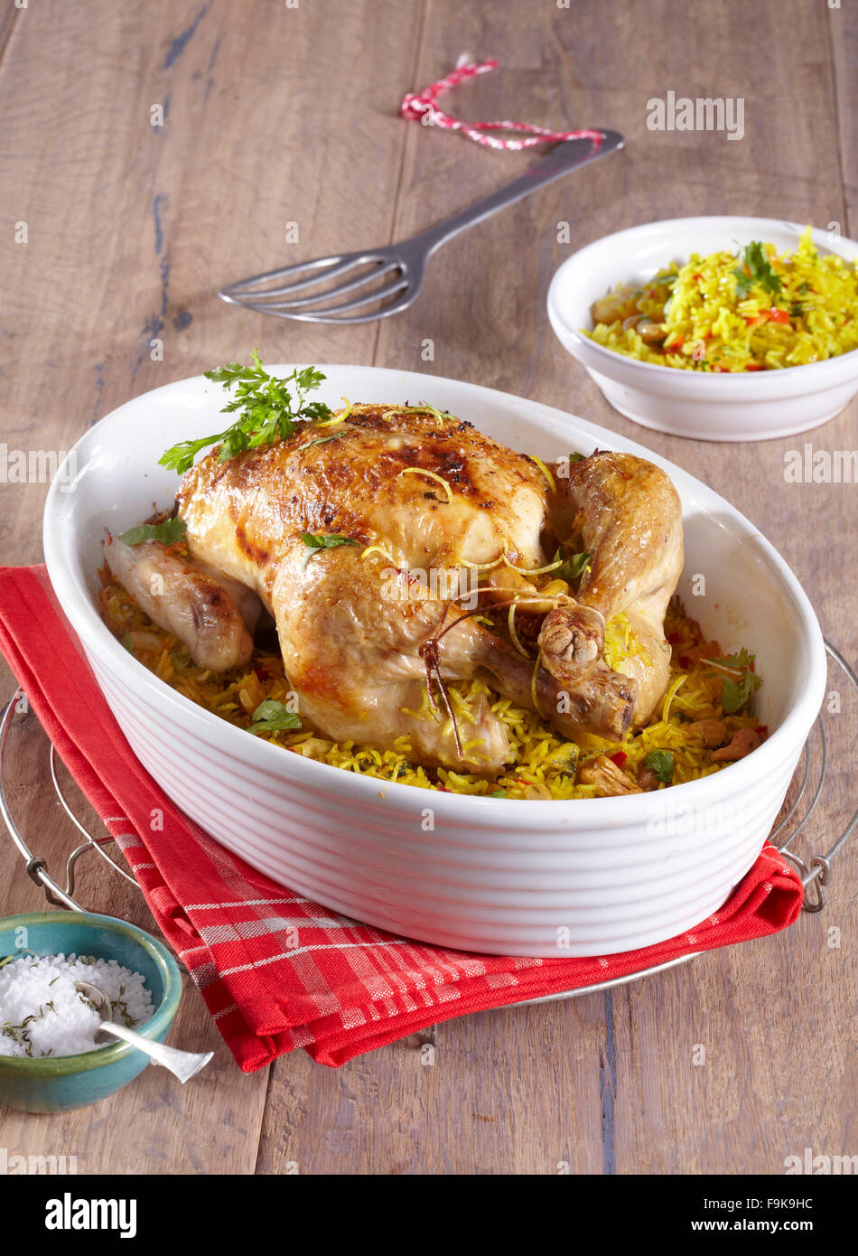 Rice stuffed chicken roast + steps Stock Photo - Alamy