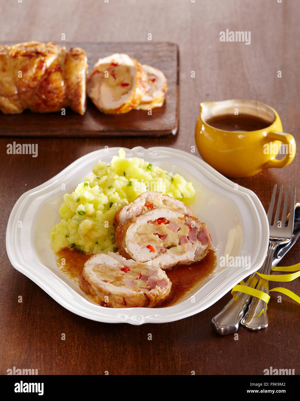 Stuffed chicken roulade Stock Photo - Alamy