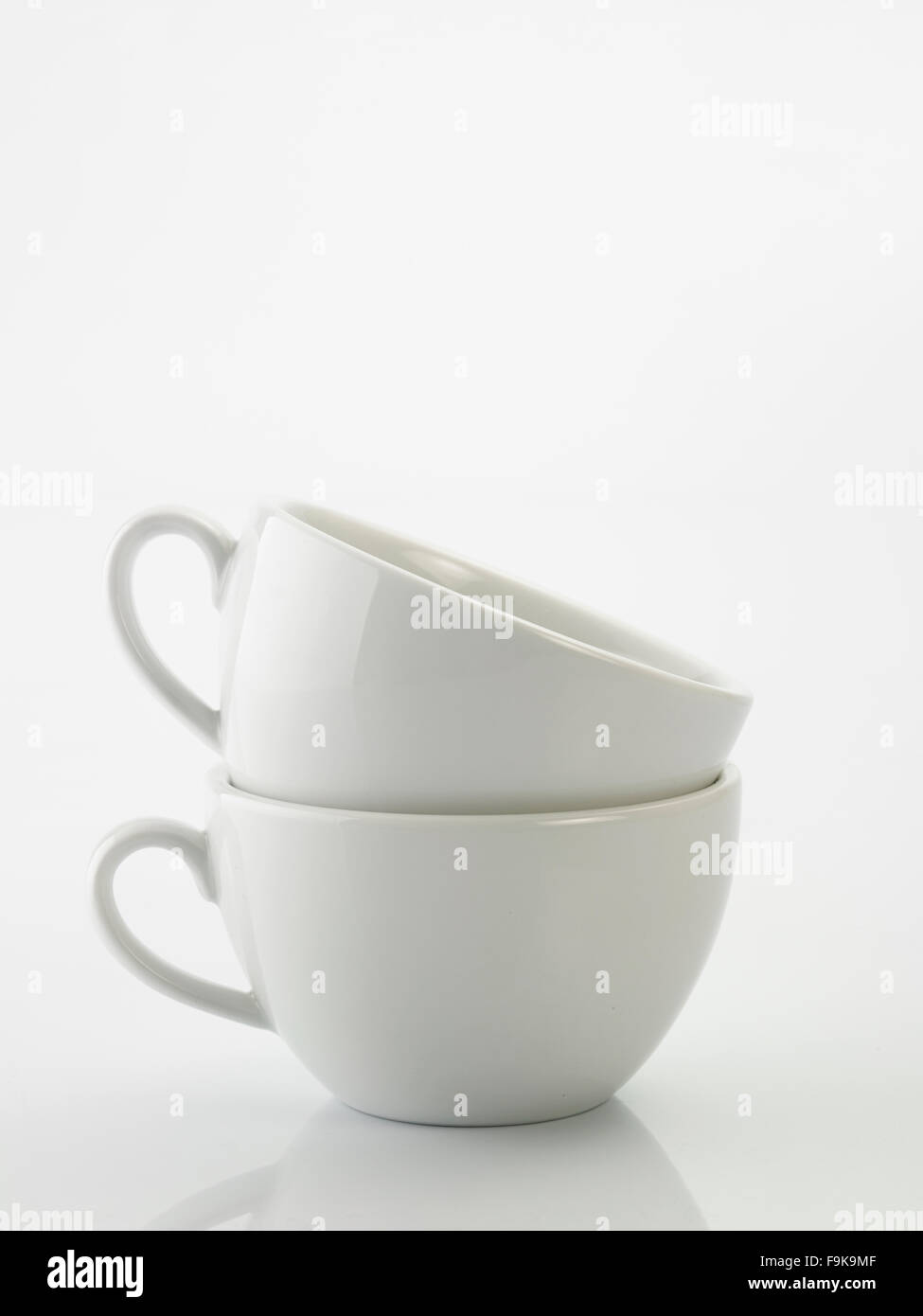 two white coffee cup stack up Stock Photo - Alamy