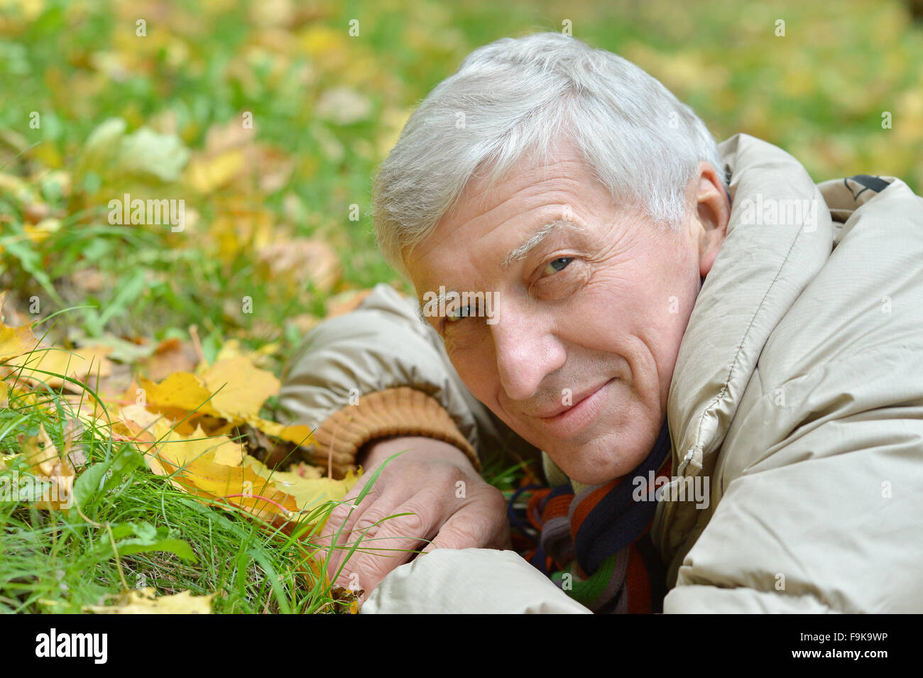 cute old man lying Stock Photo - Alamy