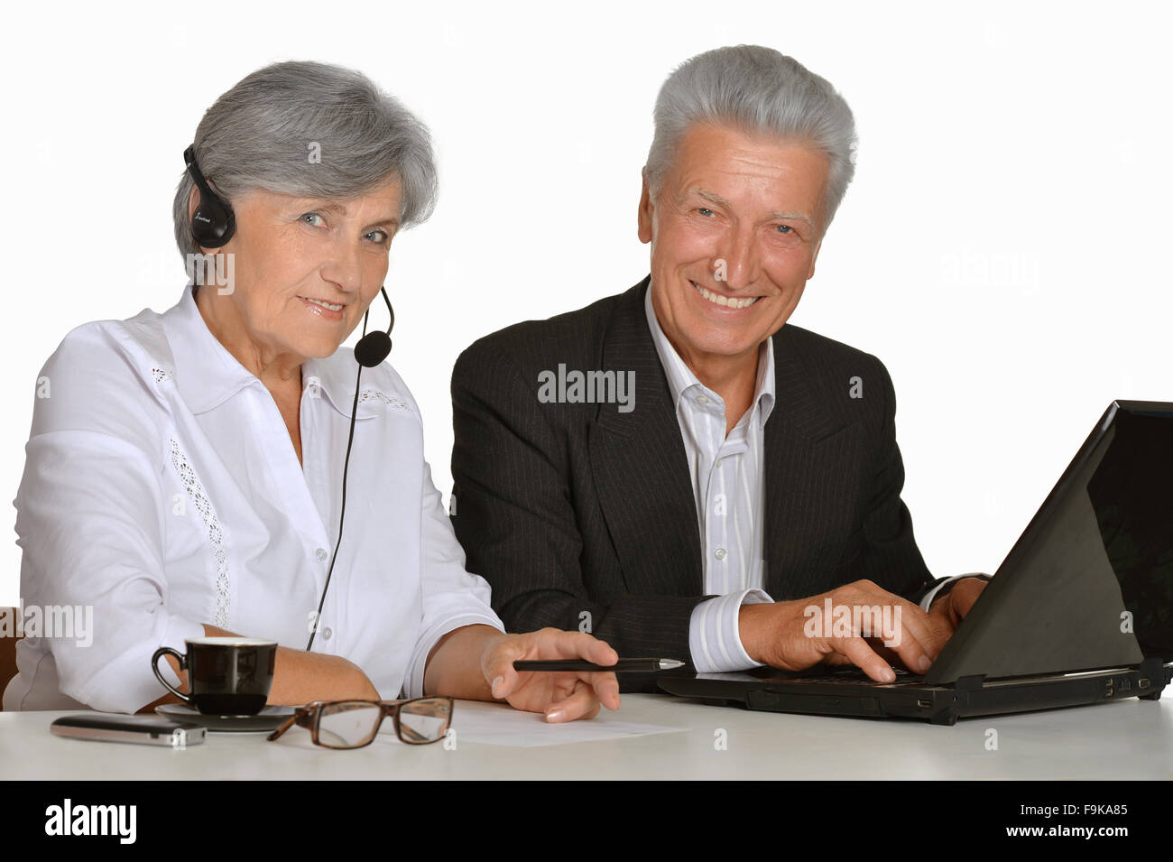 Elderly businesspeople working Stock Photo - Alamy