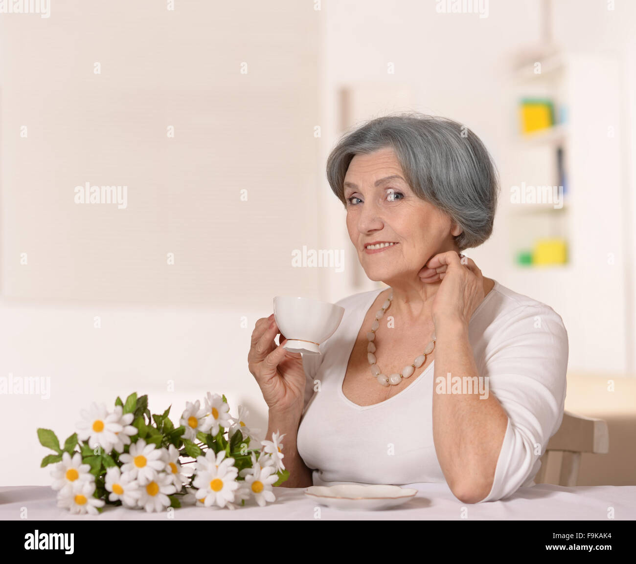 Elderly Woman with tea Stock Photo - Alamy