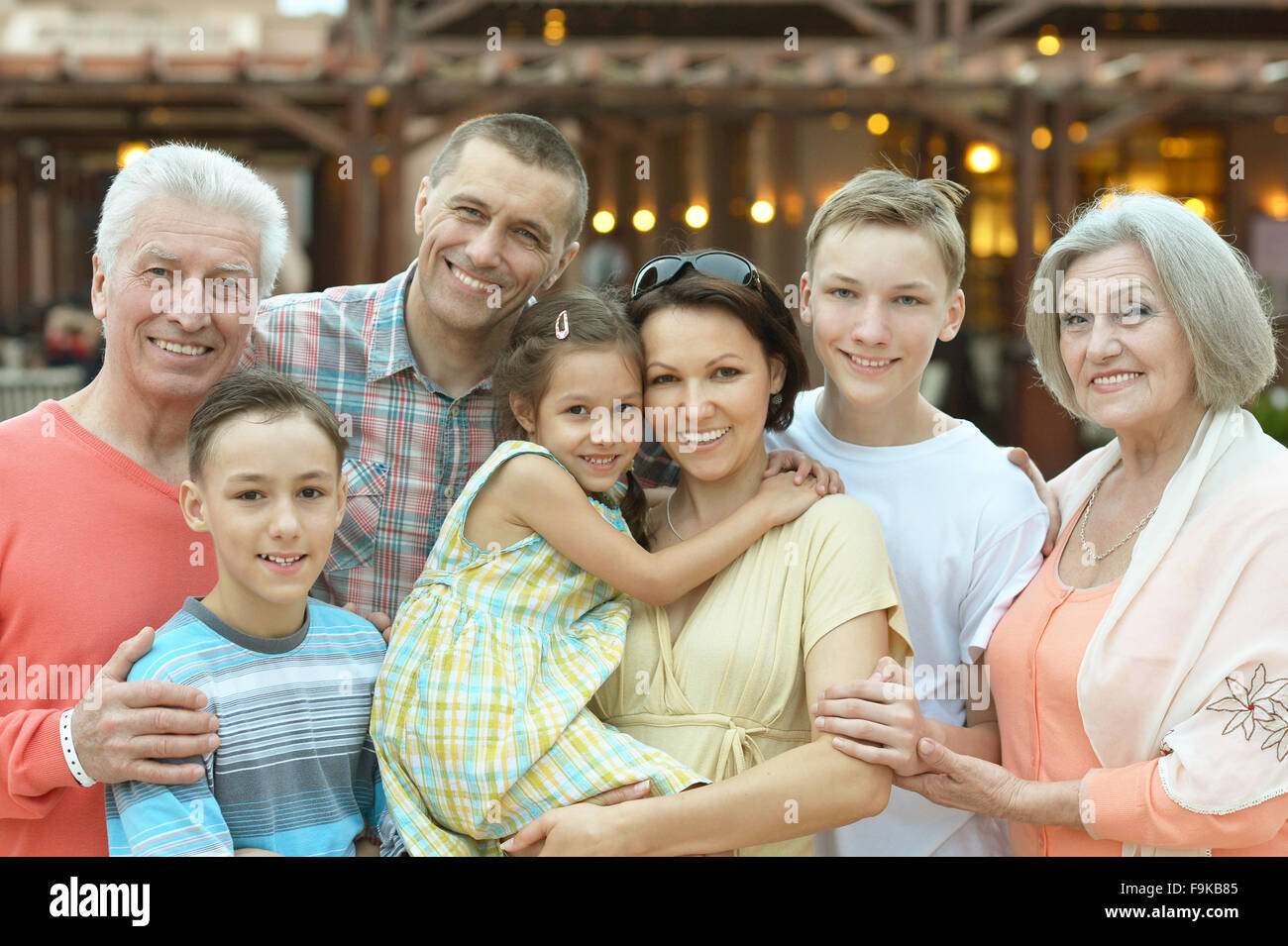 Family relaxing at resort Stock Photo - Alamy