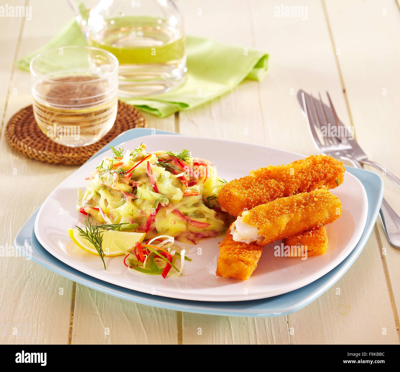 Fish fingers with colorful potato mash Stock Photo - Alamy