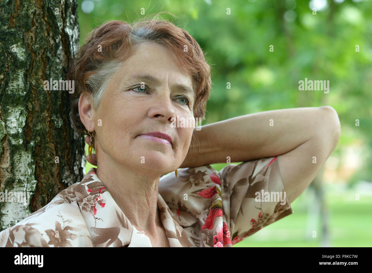 Lady enjoying summer Stock Photo - Alamy