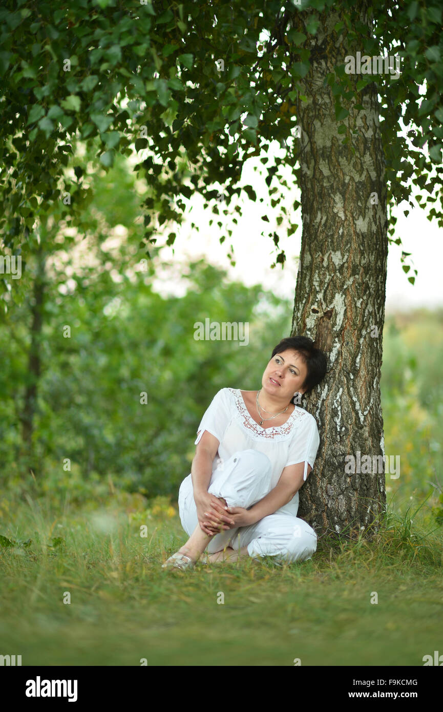 Lady enjoying summer Stock Photo - Alamy