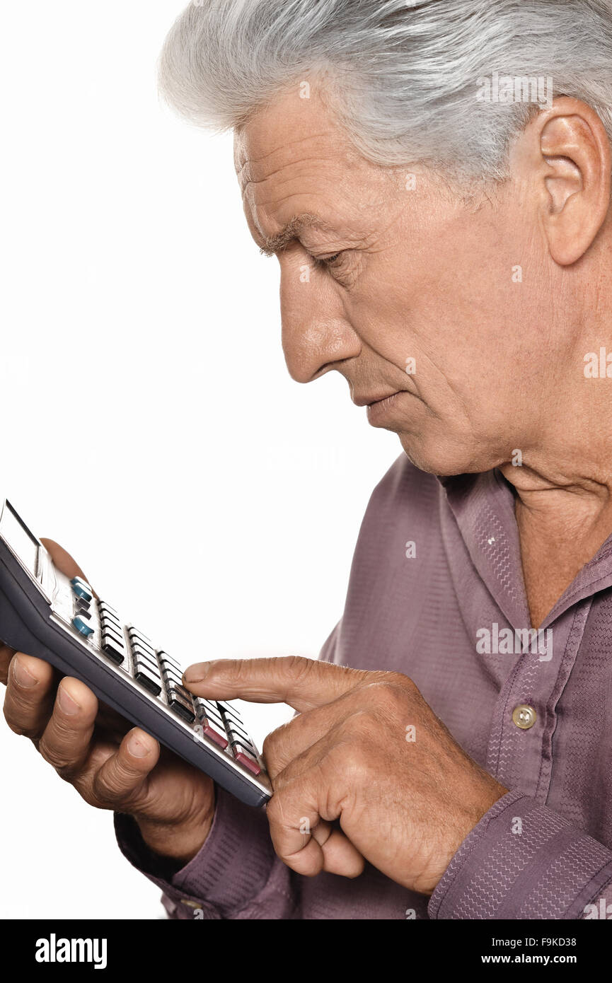 Serious man with calculator Stock Photo - Alamy