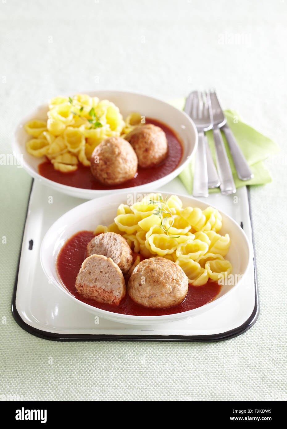 Rabbit meat balls in tomato sauce Stock Photo - Alamy