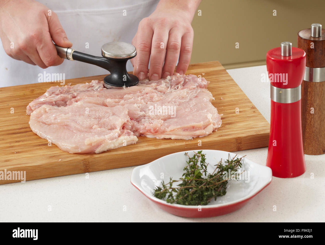 Macadamia stuffing chicken + steps Stock Photo - Alamy