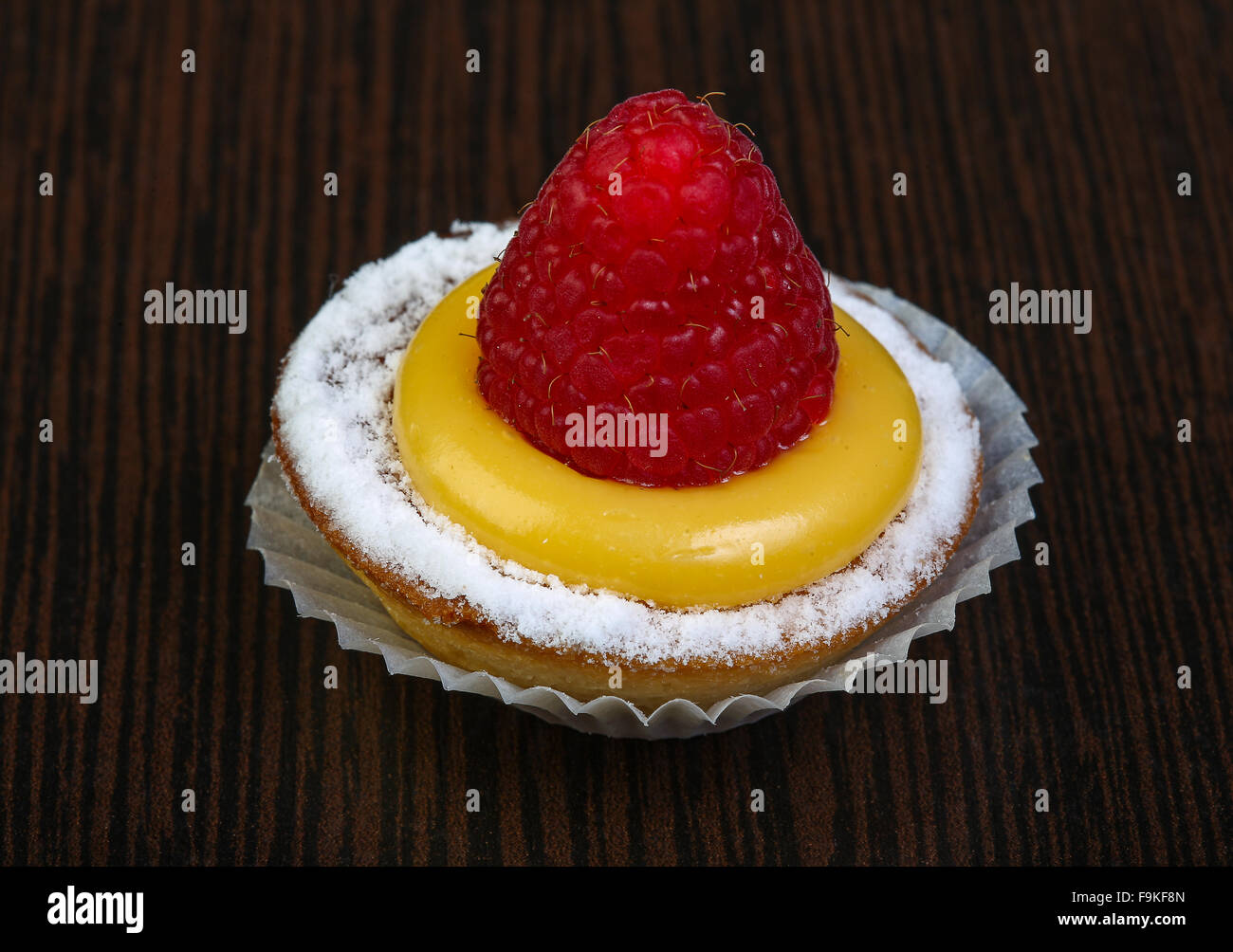 Sweet Pastry with berries on the wood background Stock Photo - Alamy