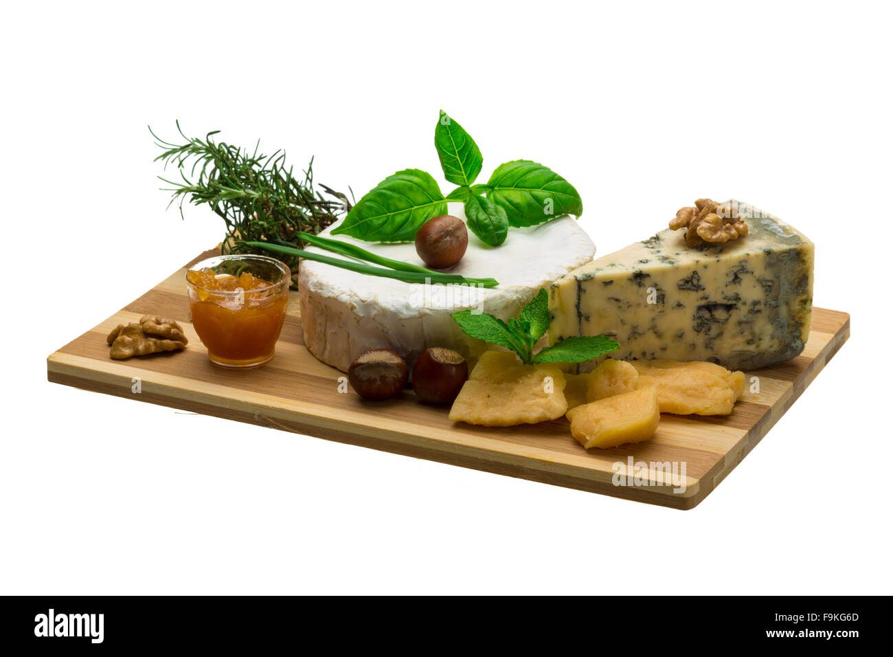 Assorted cheese - brie, dor blue and hard old yellow cheese Stock Photo ...