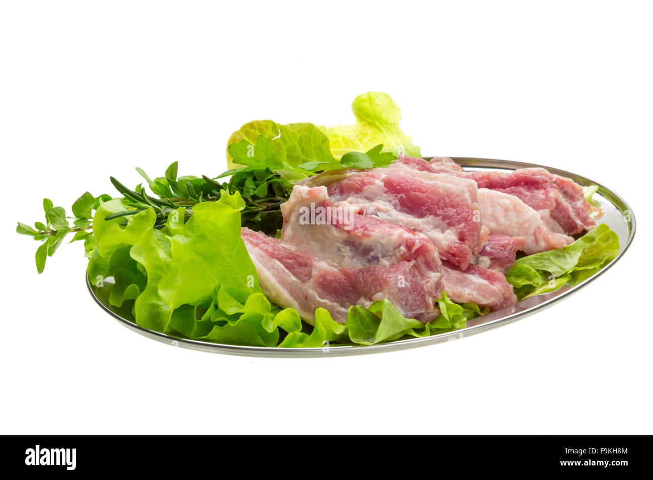 Raw pork meat with herbs and spices Stock Photo - Alamy