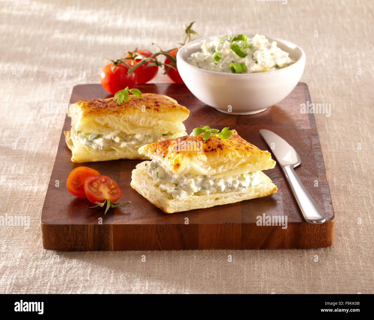 Puff pastry sandwich with blue cheese cream Stock Photo - Alamy