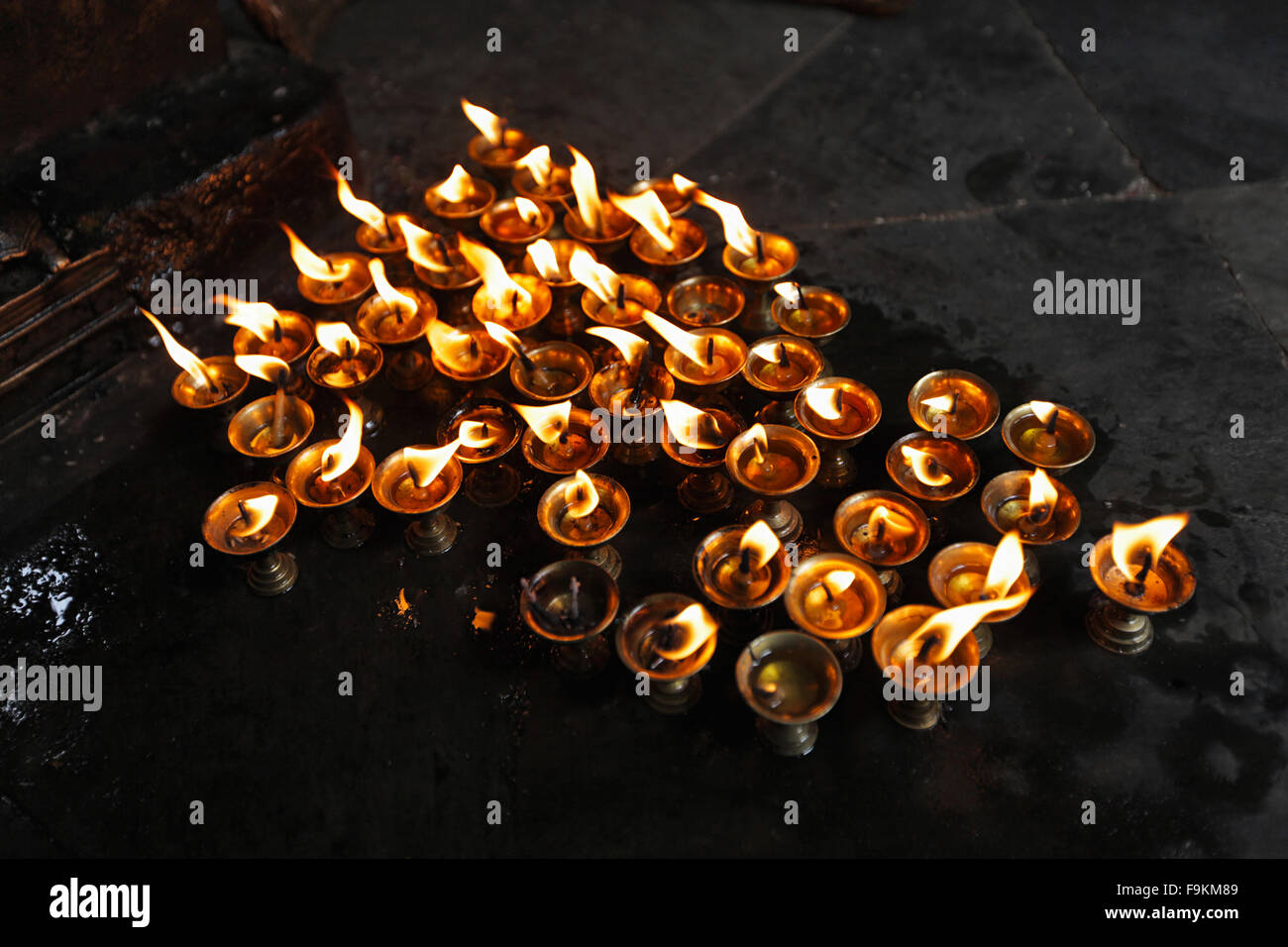 Butter lamps offered by devotees, Hiranya Varna Mahaviharin Patan ...