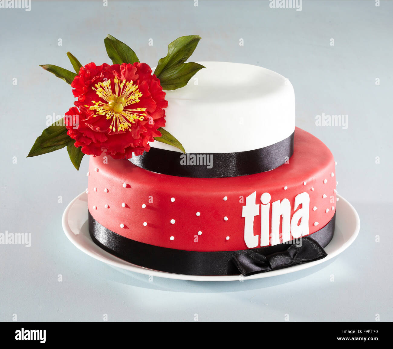 Birthday layer cake Tina Stock Photo - Alamy