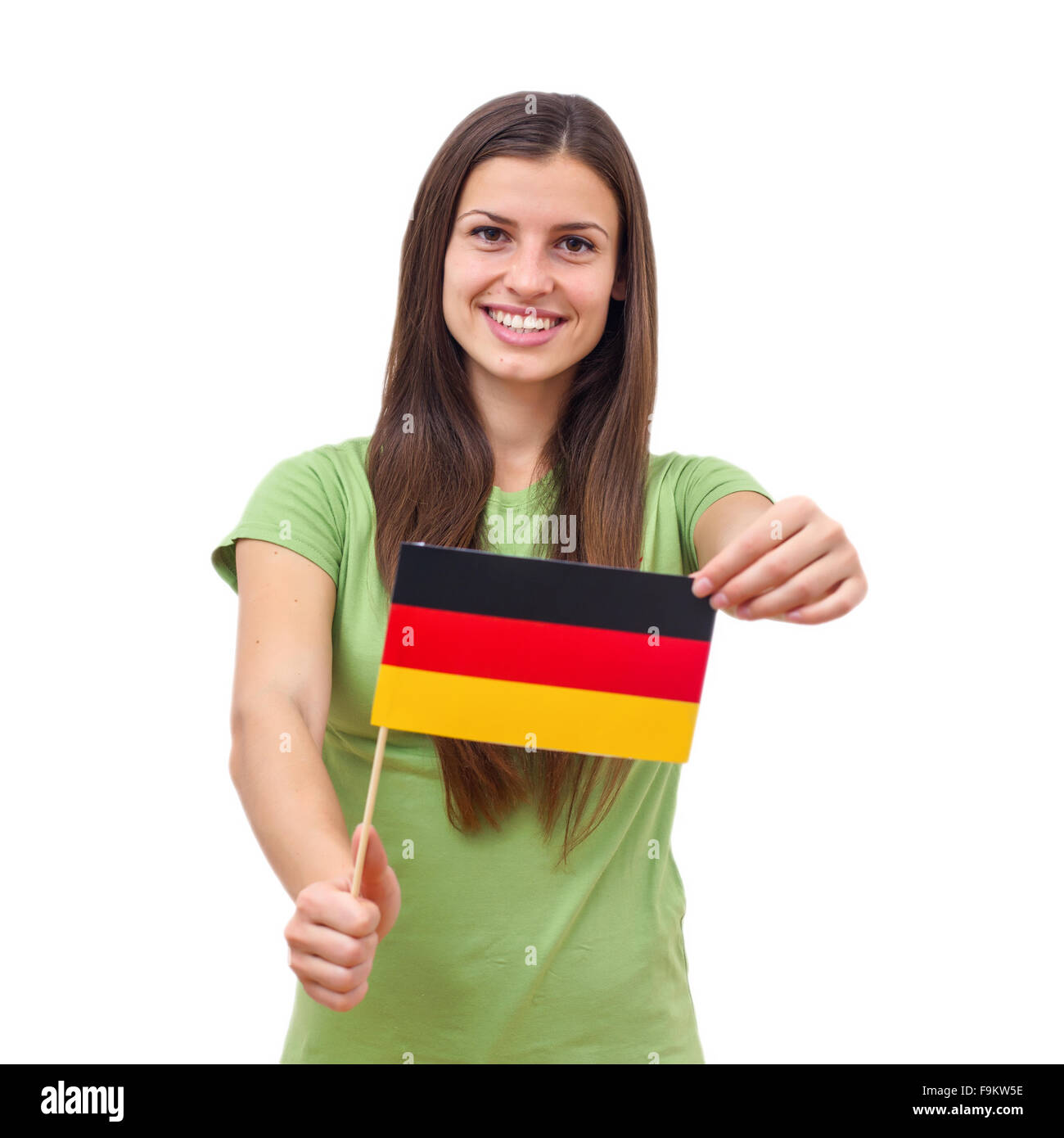 Beautiful young woman holding German Flag over white background Stock ...