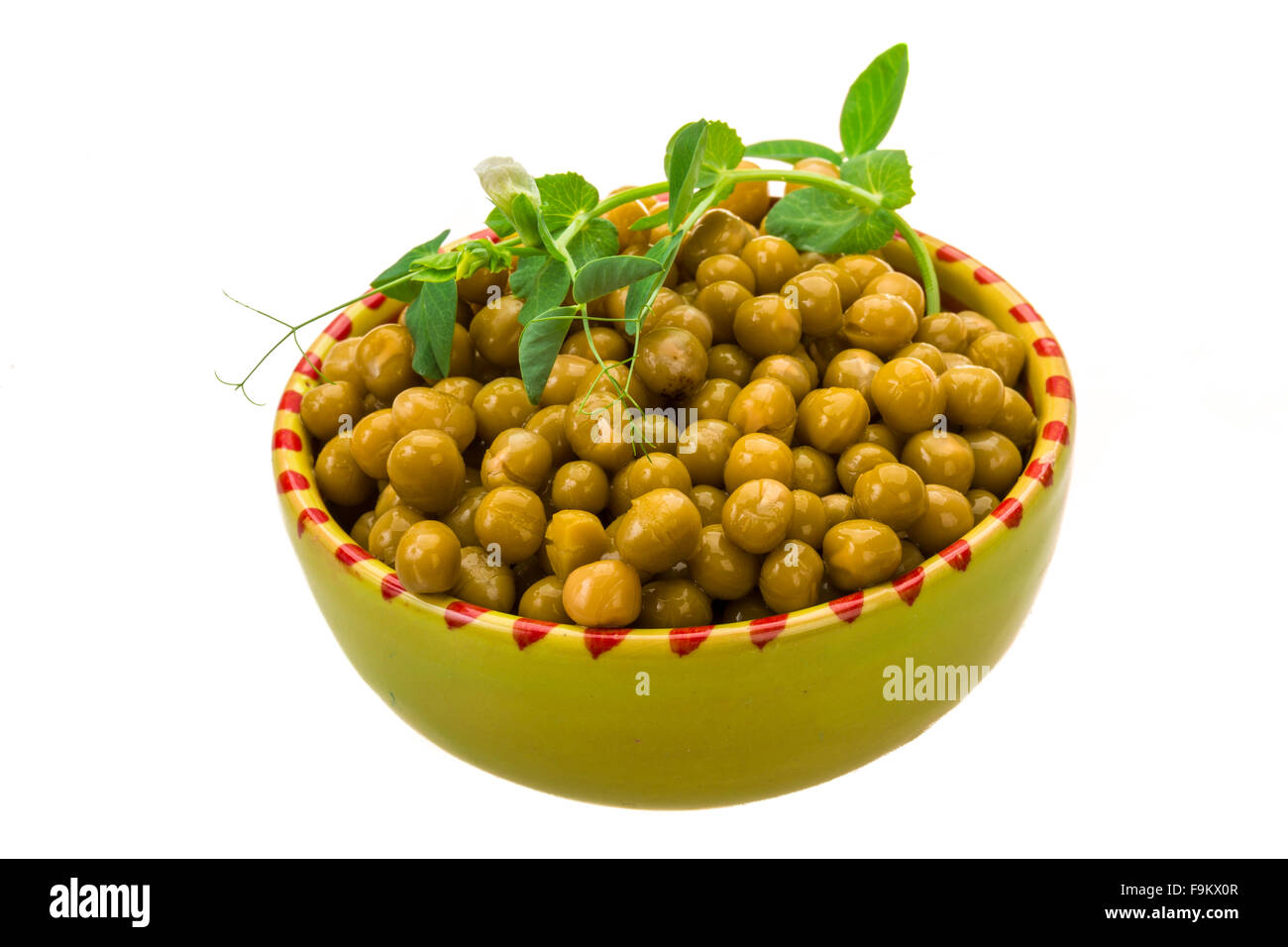 Marinated green peas with branch Stock Photo - Alamy