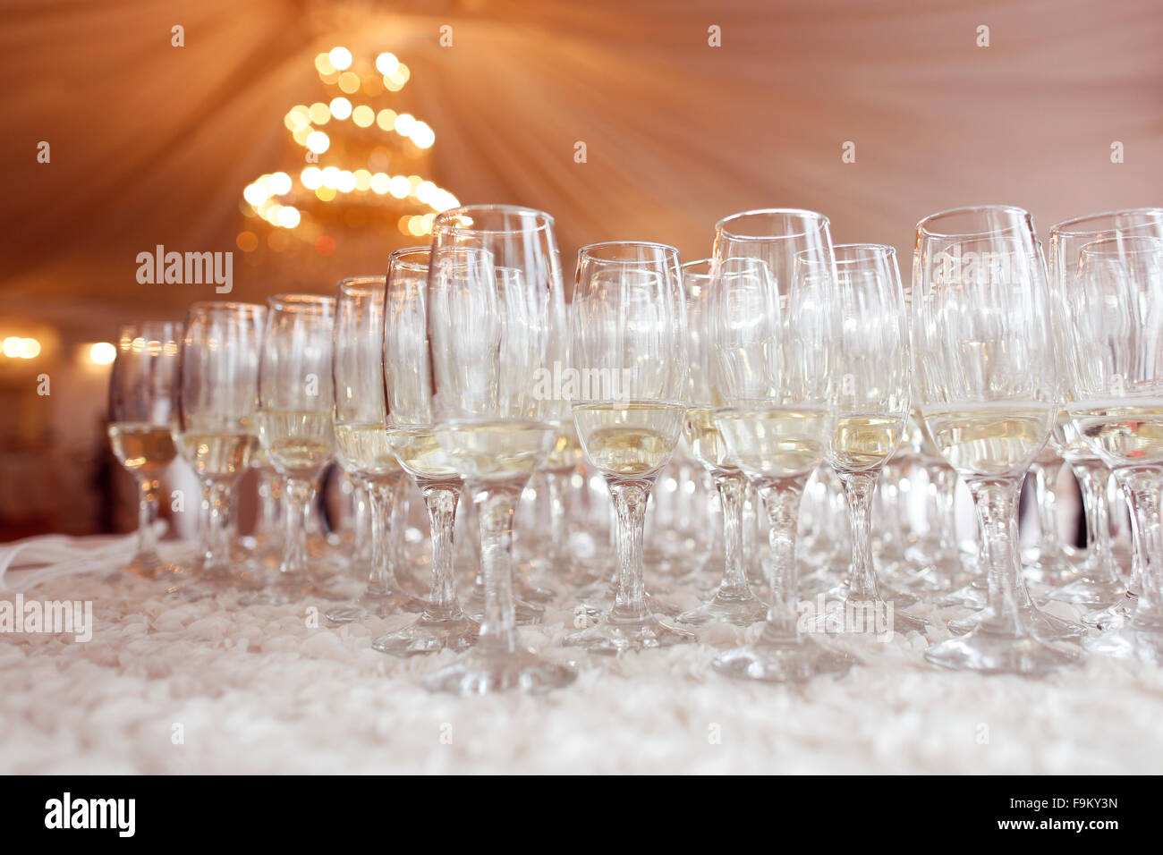 Many glasses of champagne at wedding reception Stock Photo - Alamy