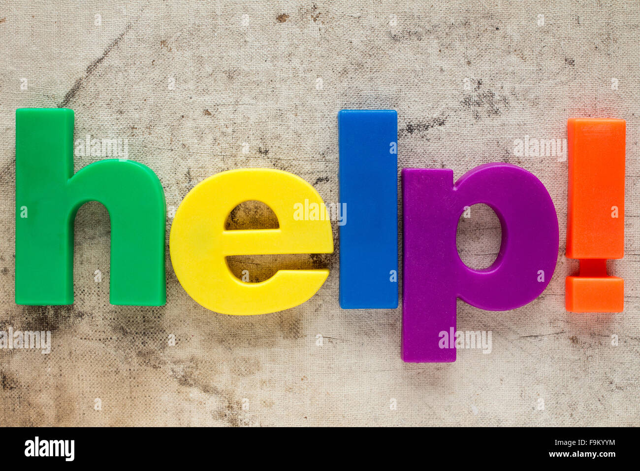 Letter magnets spelling word help hi-res stock photography and images ...