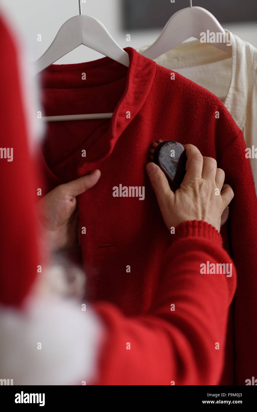 Santa Claus at Home cleaning his Costume, Preparing for Work Stock ...