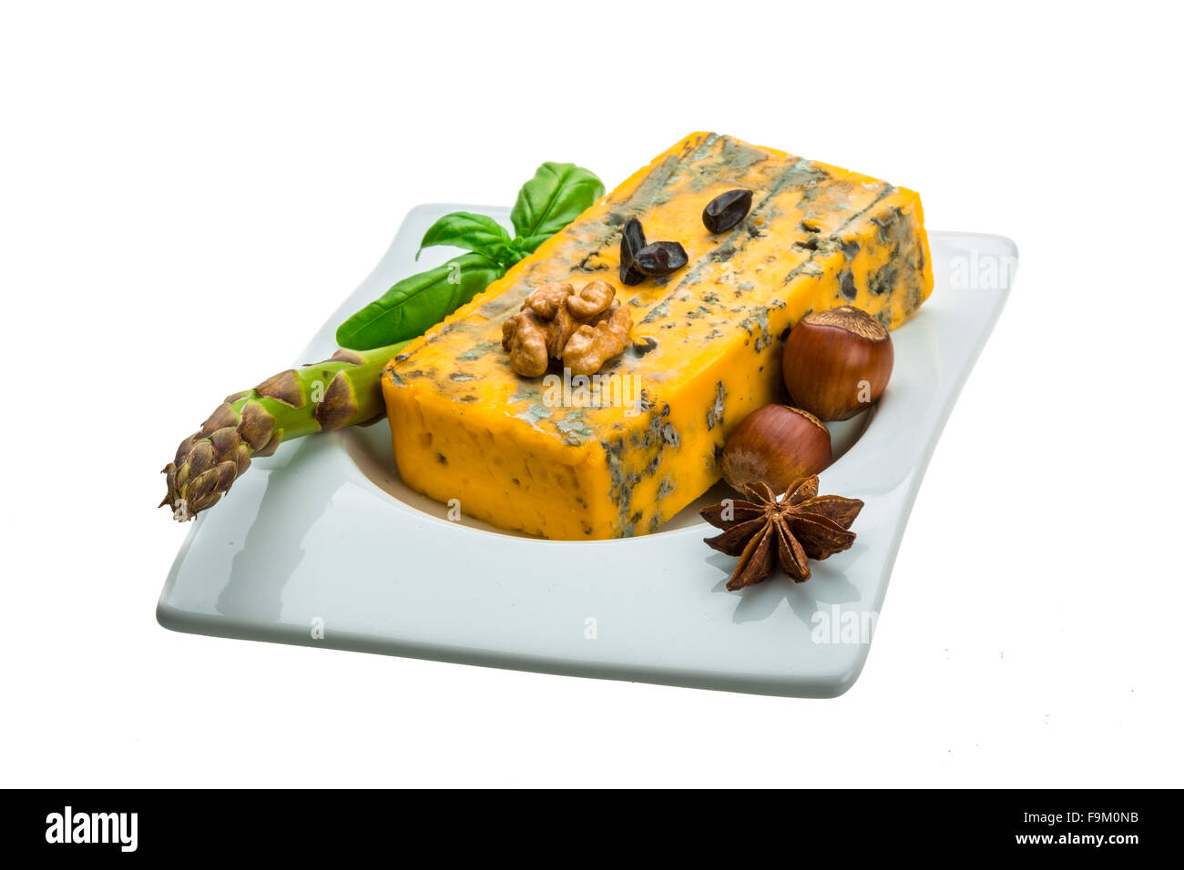 Gold cheese with mould Stock Photo - Alamy