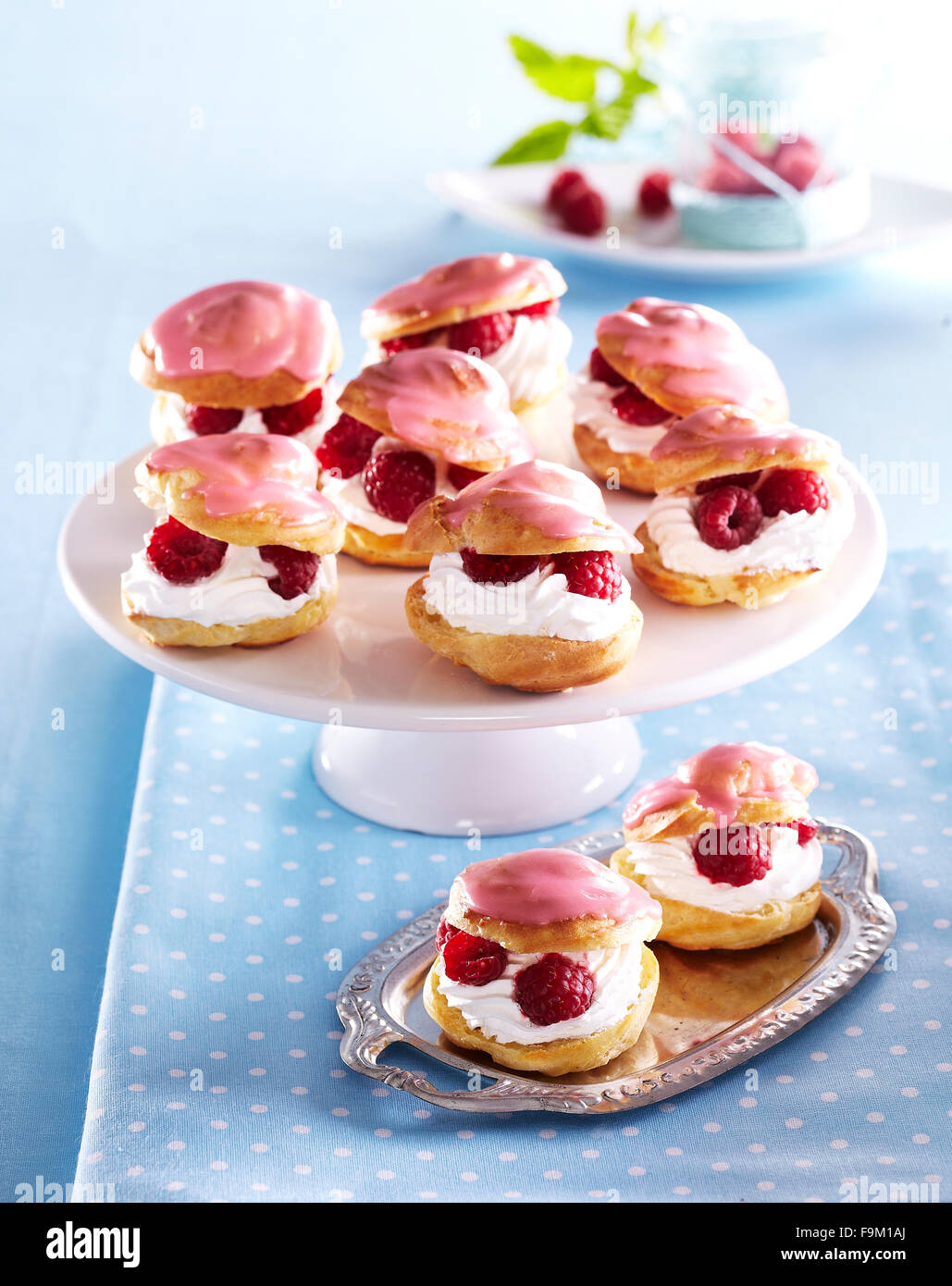 Raspberry cream puffs Stock Photo - Alamy