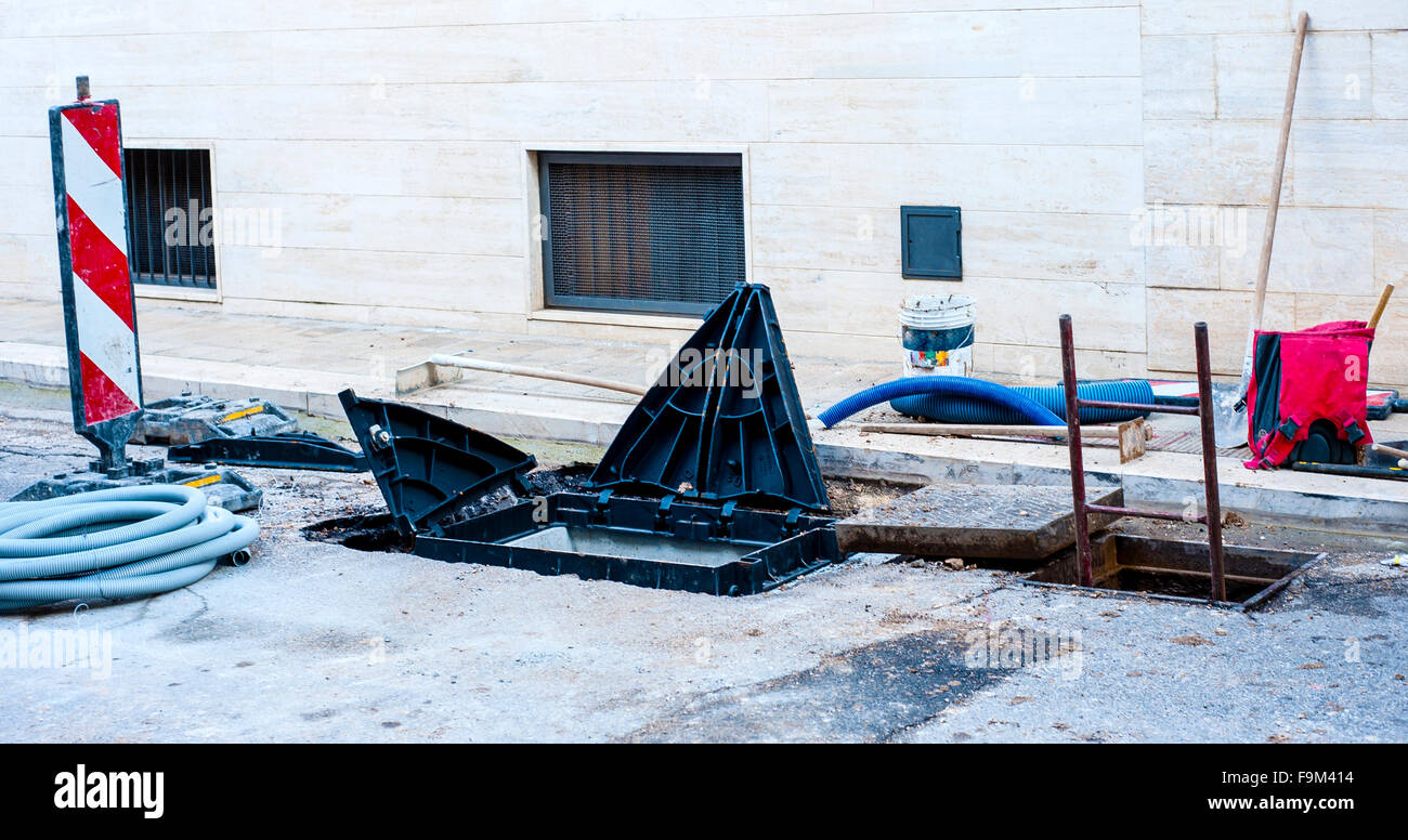 work under way in a cockpit road for telephone network voice and data ...
