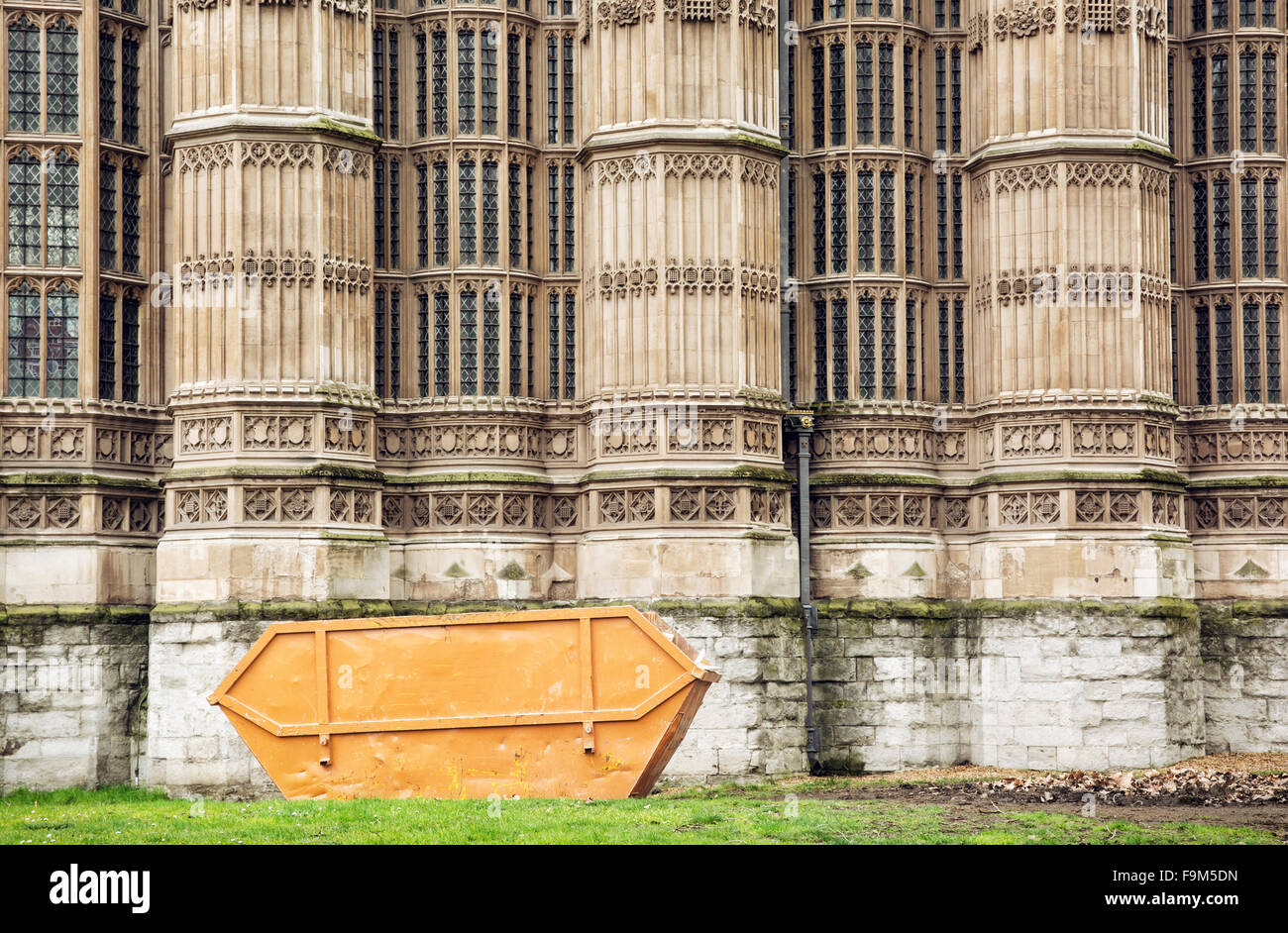 Closeup photo of Westminster palace with big garbage container, London ...