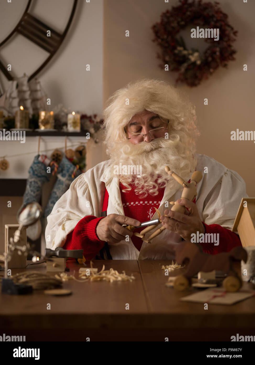 Santa claus home making toys hi-res stock photography and images - Alamy