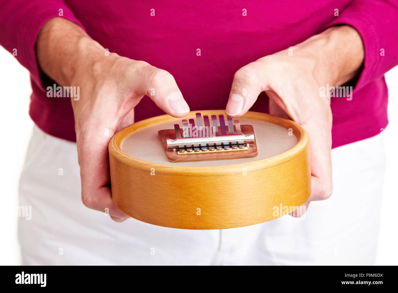 Kalimba playing hi-res stock photography and images - Alamy