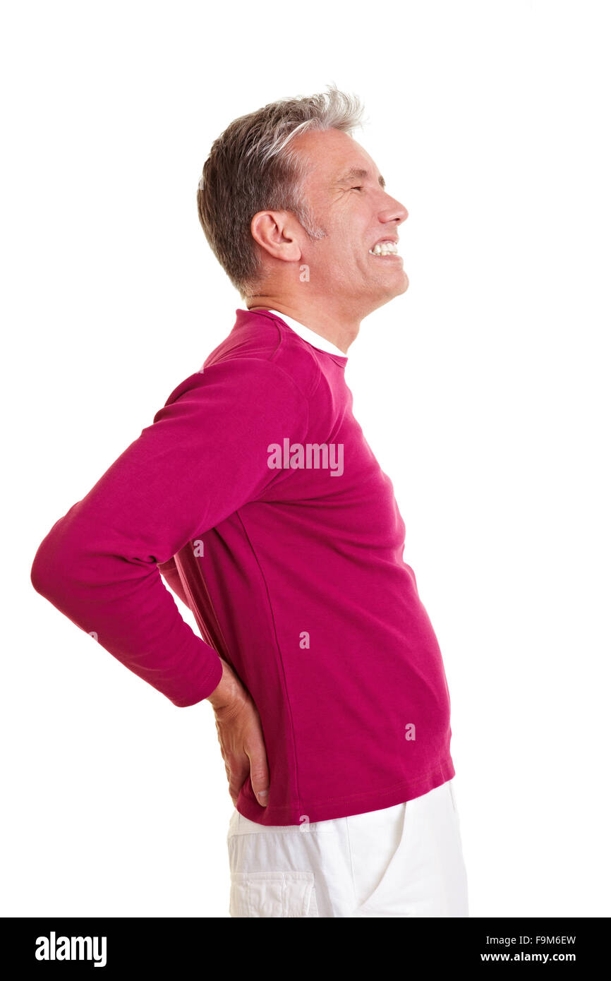 Senior man with back pain holding his aching back Stock Photo - Alamy