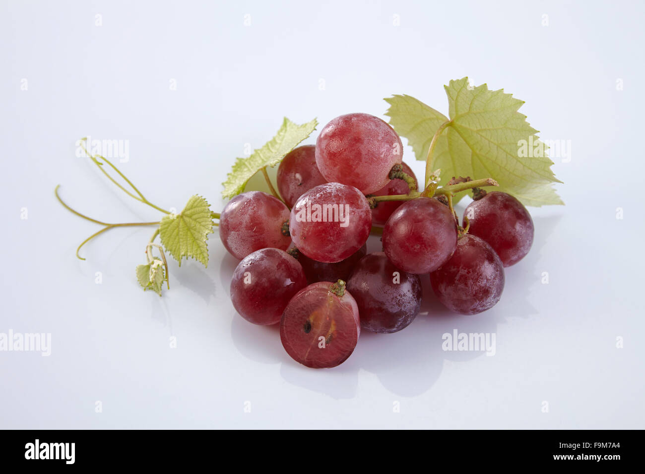 red grape isolated on white Stock Photo - Alamy