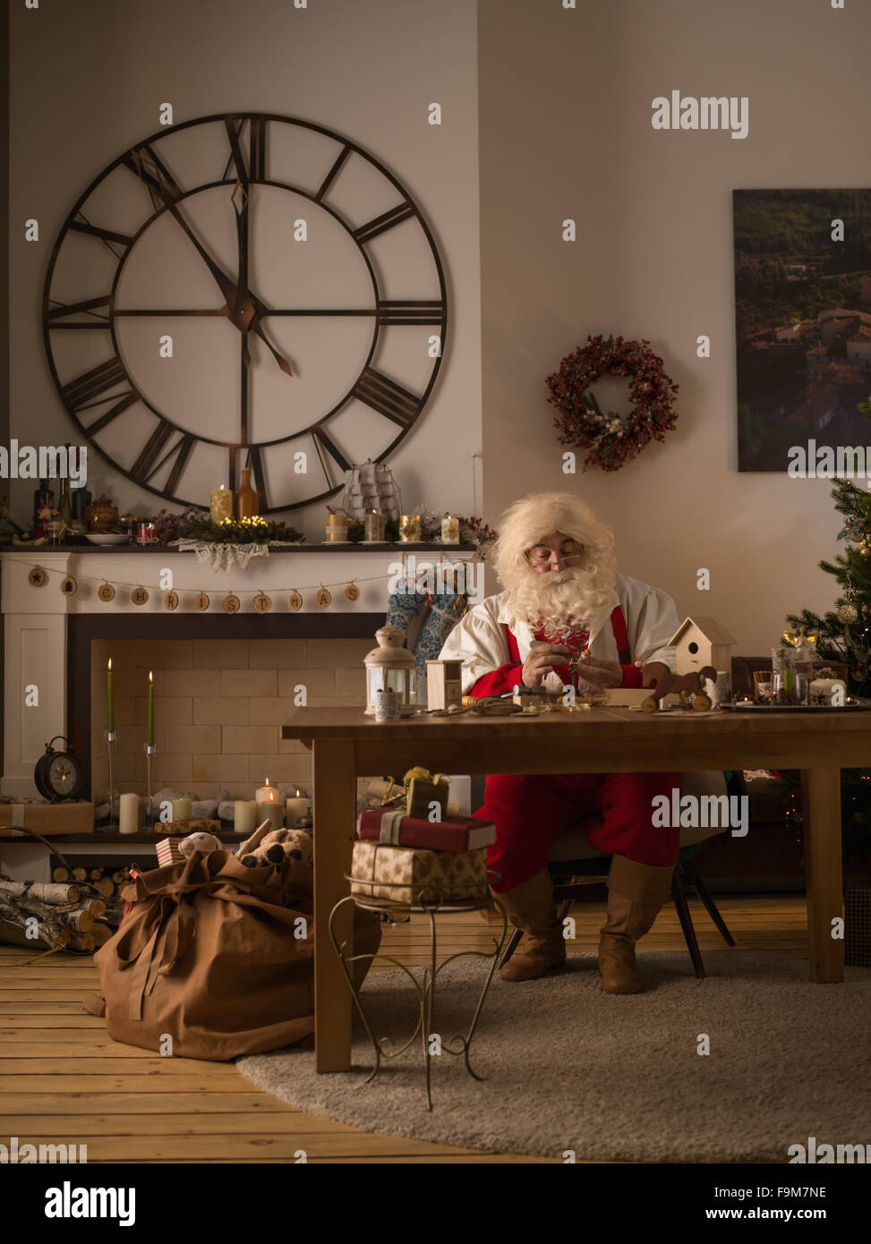 Santa claus home making toys hi-res stock photography and images - Alamy
