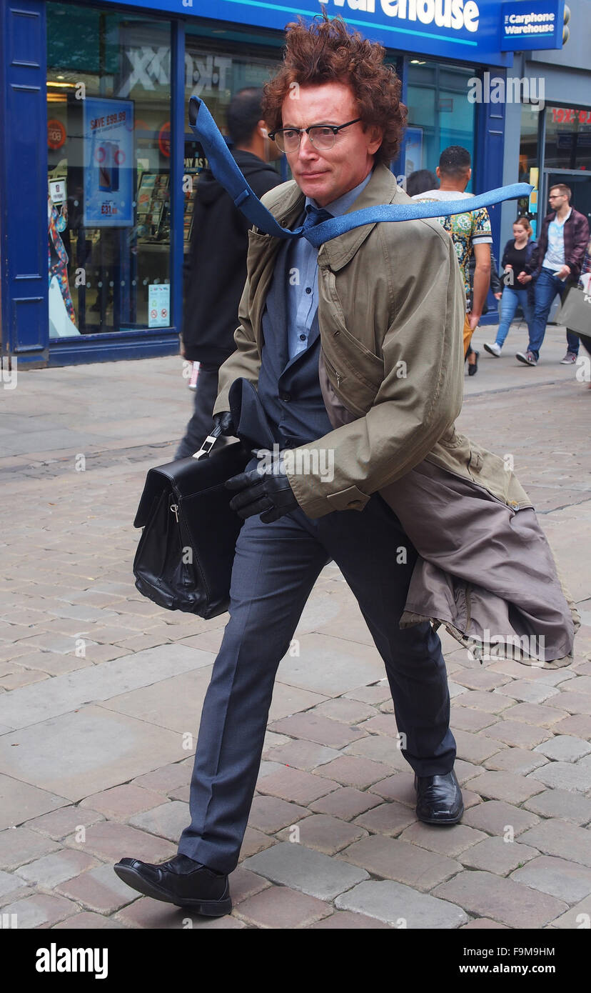 Living statue "The Windblown Man" performer outside the Arndale centre ...
