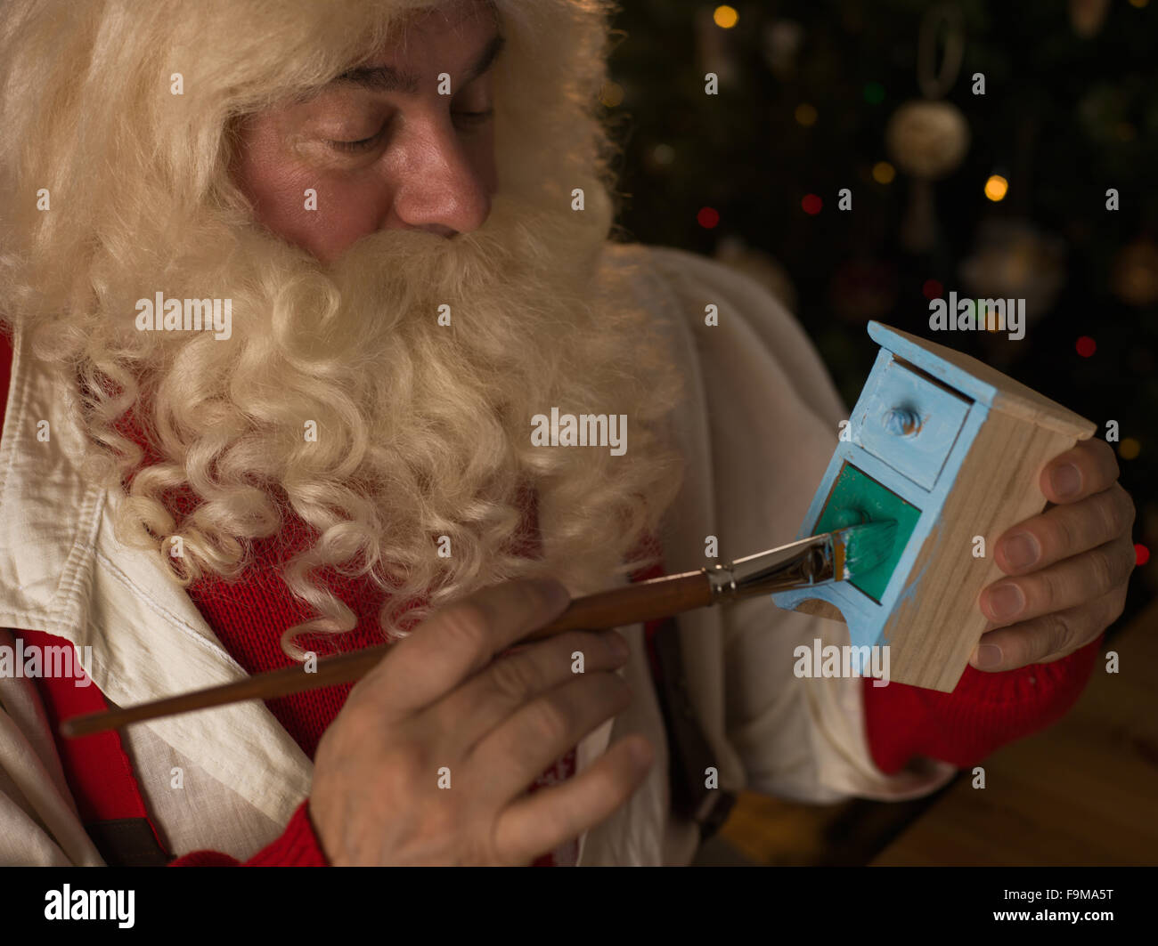 Santa claus home making toys hi-res stock photography and images - Alamy