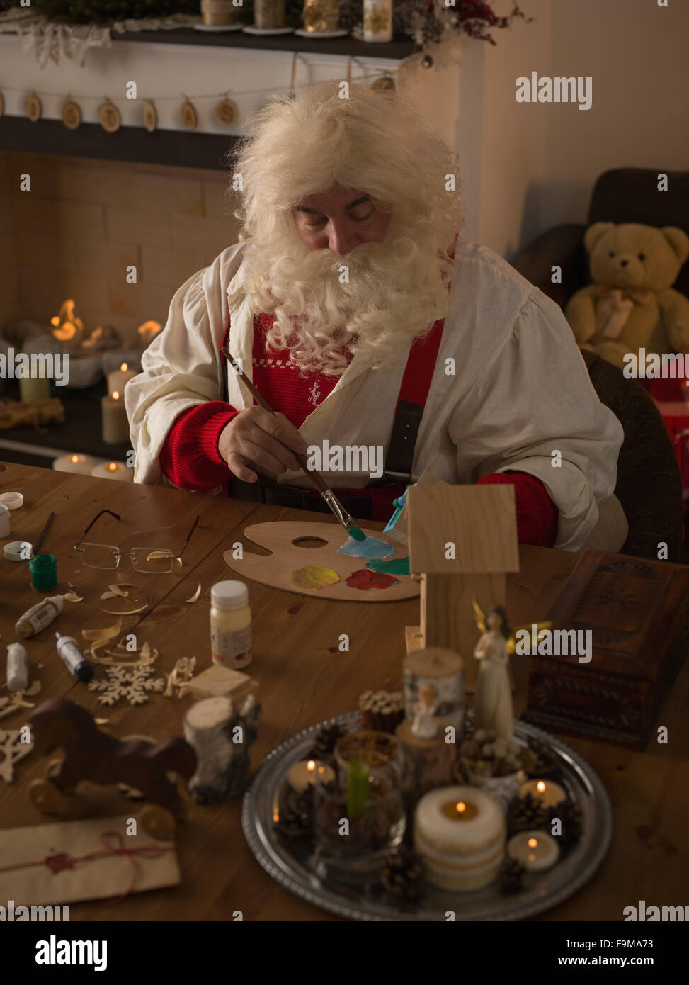 Santa claus home making toys hi-res stock photography and images - Alamy