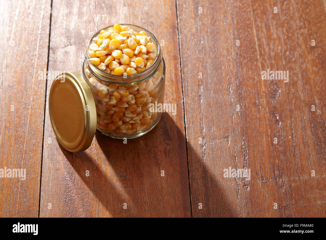 maize corn in a glass container Stock Photo - Alamy
