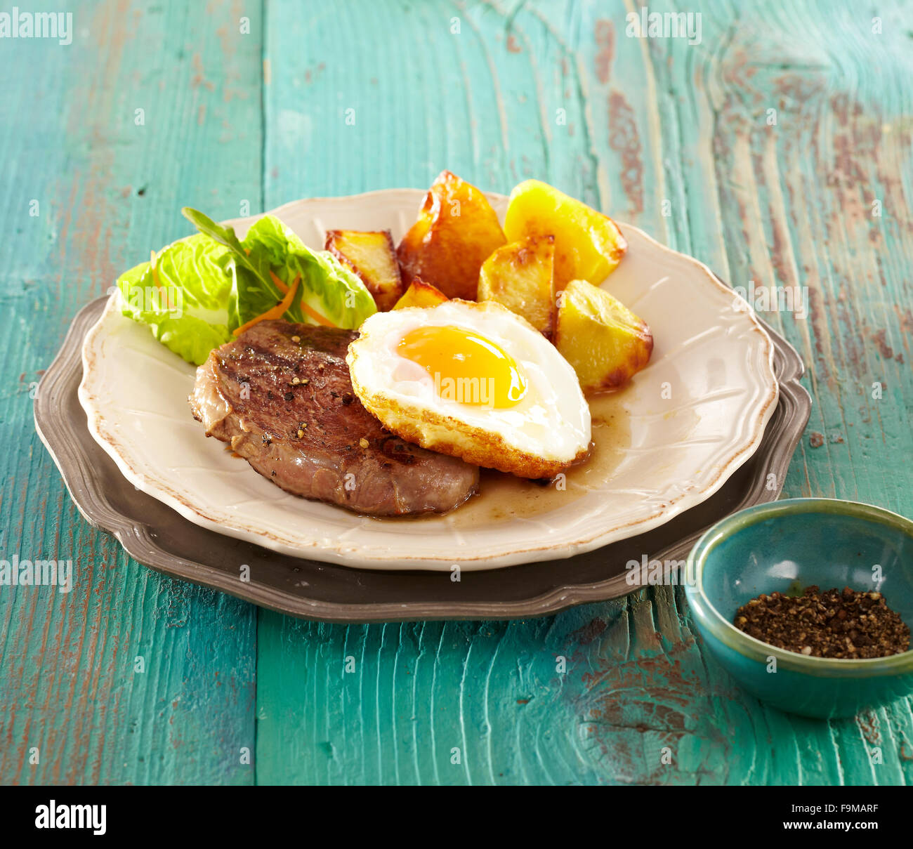 Ostrich steak with fried egg Stock Photo - Alamy