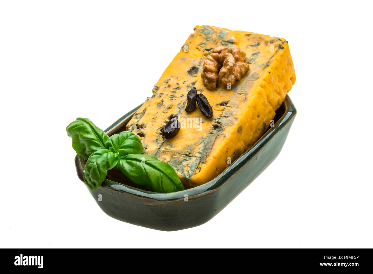 Gold cheese with mould Stock Photo - Alamy