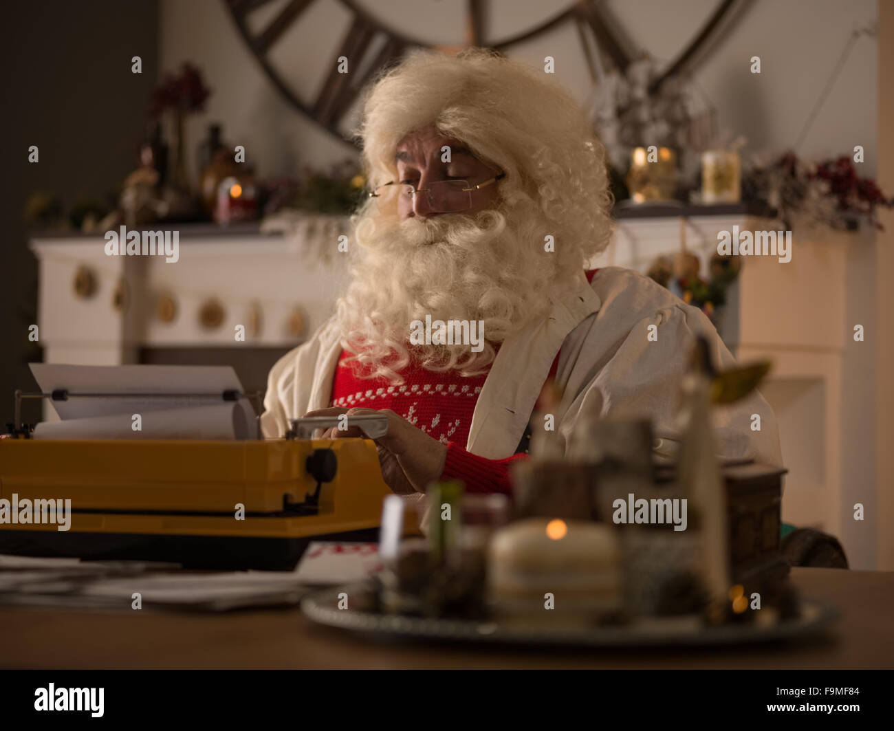 Santa Claus Working at Home. Reading and Writing letters for Children ...