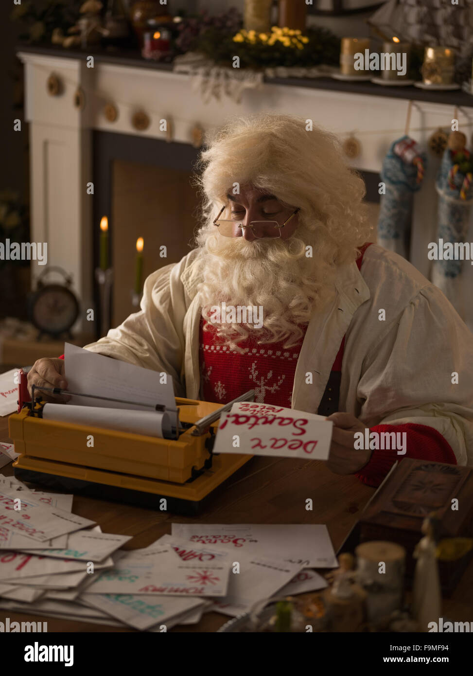 Santa Claus Working at Home. Reading and Writing letters for Children ...