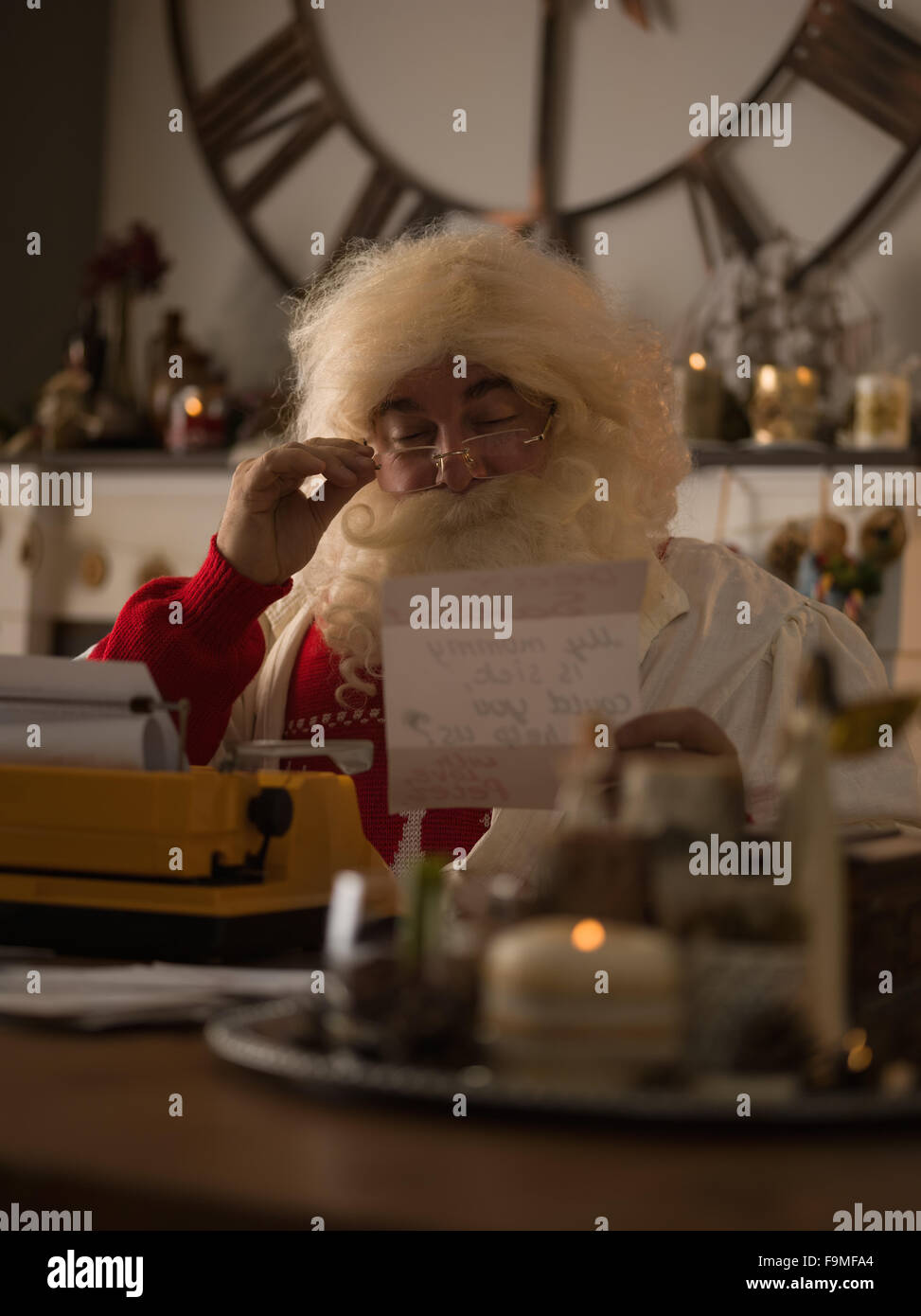 Santa Claus Working at Home. Reading and Writing letters for Children ...