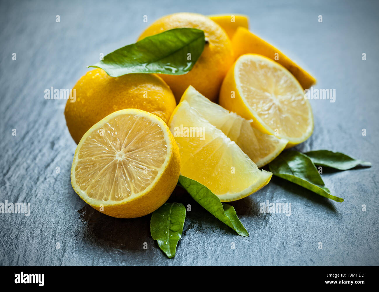 Lemon on black hi-res stock photography and images - Alamy