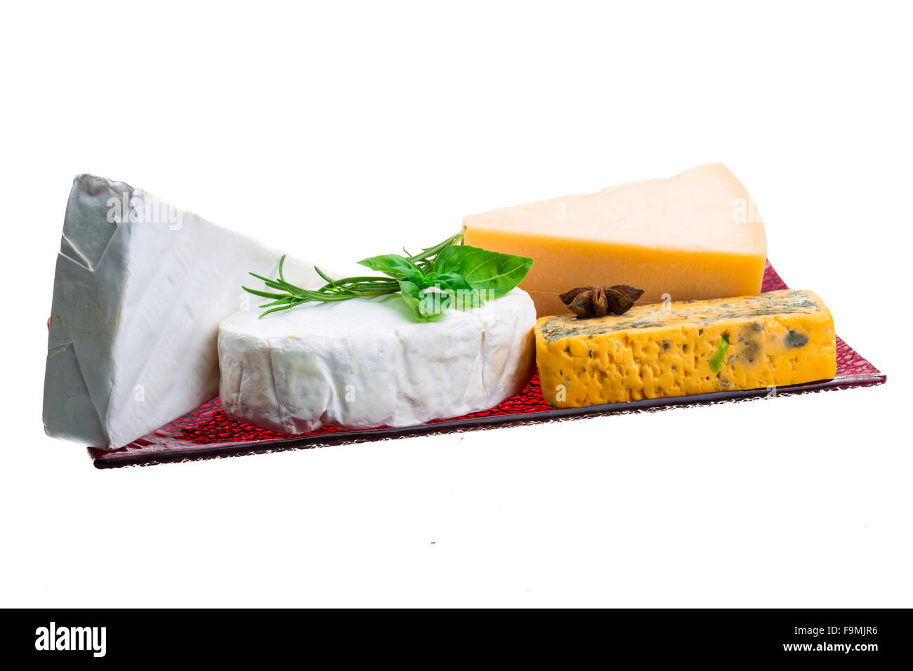 Variety cheese assortment with nuts and herbs Stock Photo - Alamy